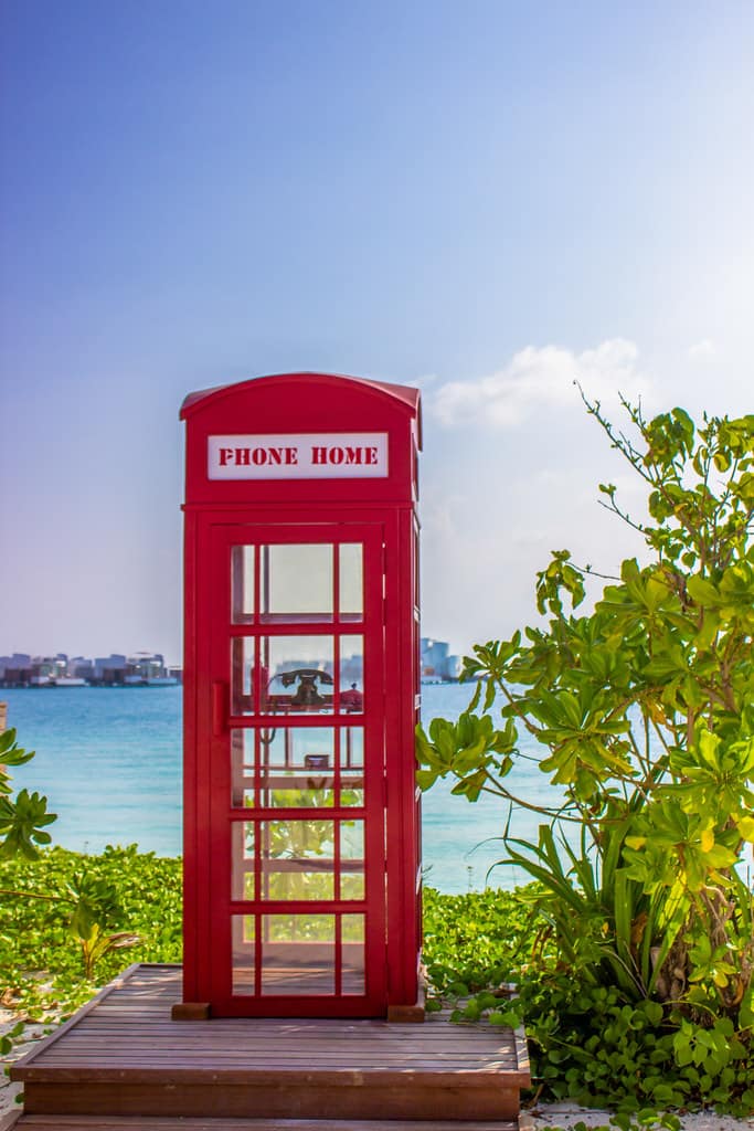 Red Telephone Box on the Beach Photo | Download free images from Mystock