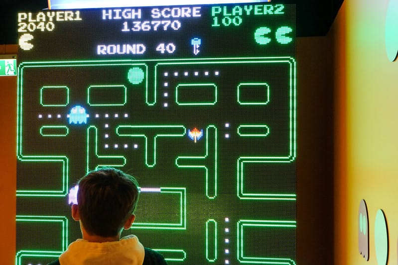 Kid Playing PAC-MAN Photo | Download free images from Mystock